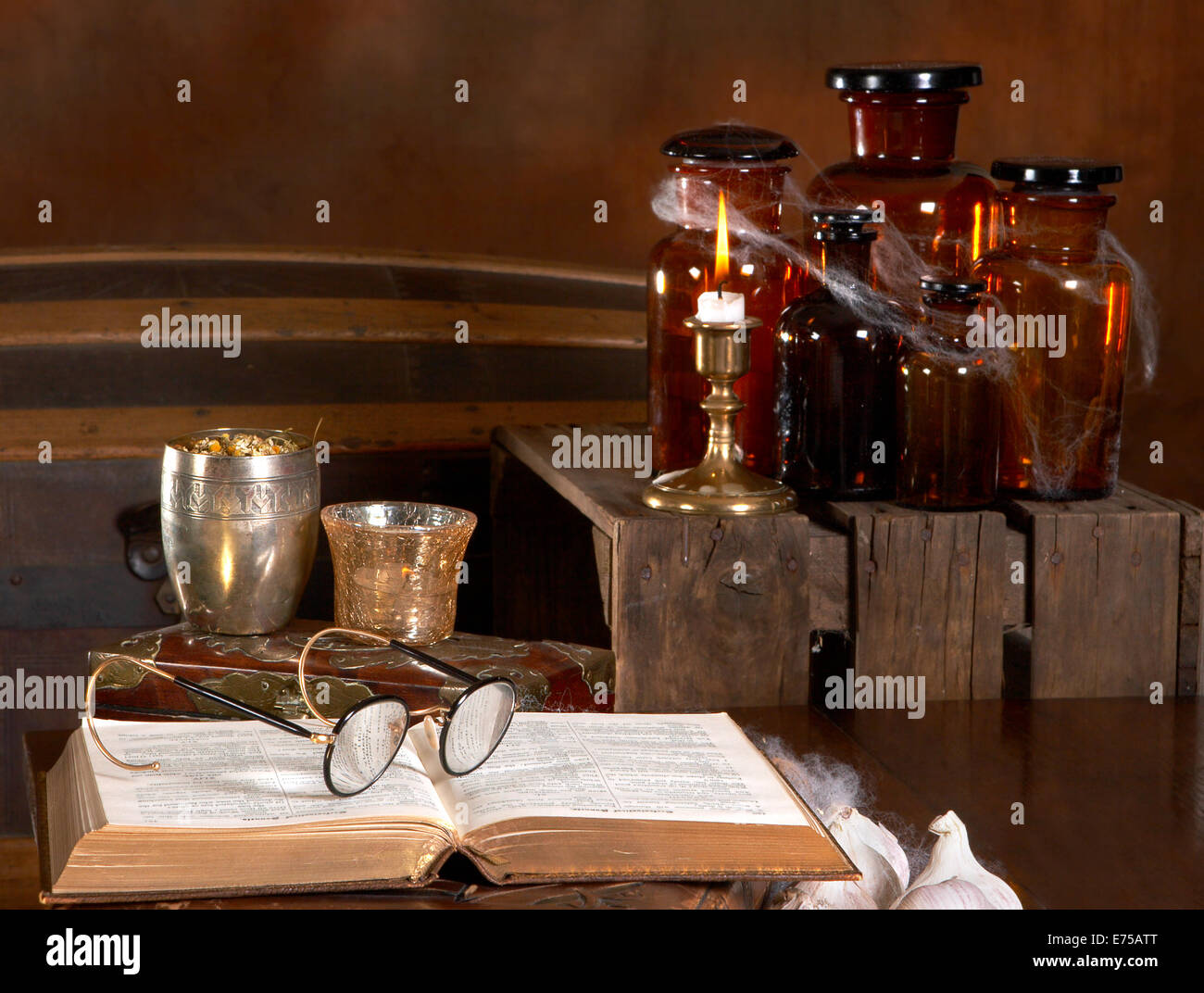 View in the kitchen of a wizard or witch, with recipe books and poison ...