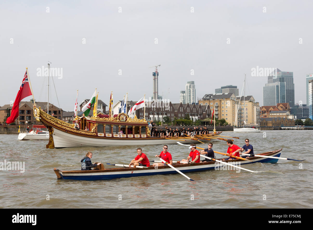 The Royal row barge Gloriana and a rowing boat. Royal Greenwich Tall ...
