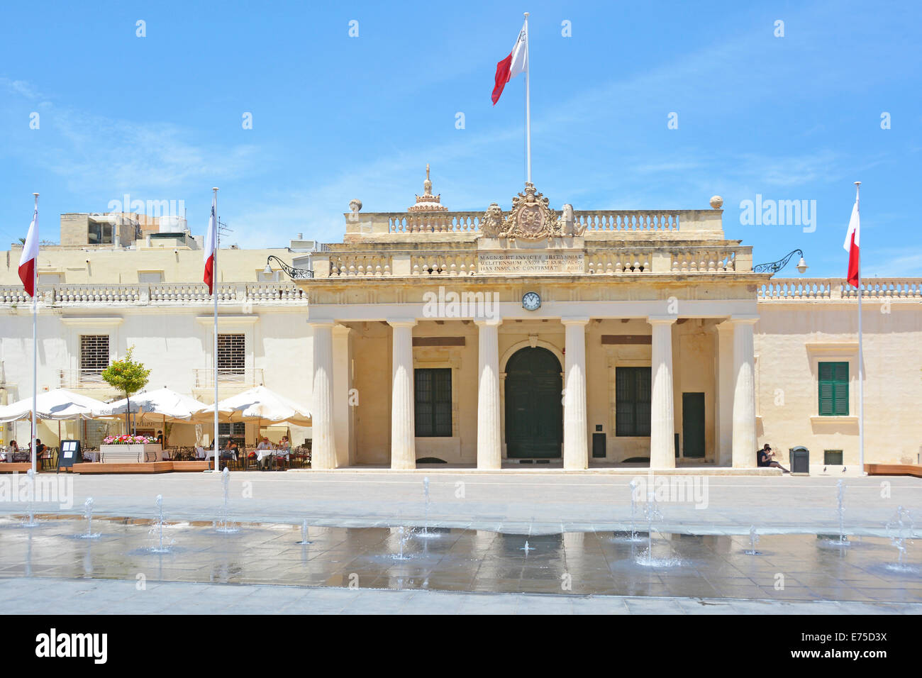 Main Guard building with flags and pavement fountain in St George's ...