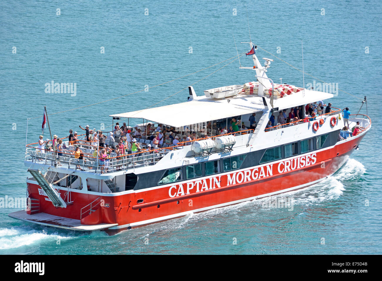 Looking down on people on board a "Captain Morgan Cruises" vessel on a ...
