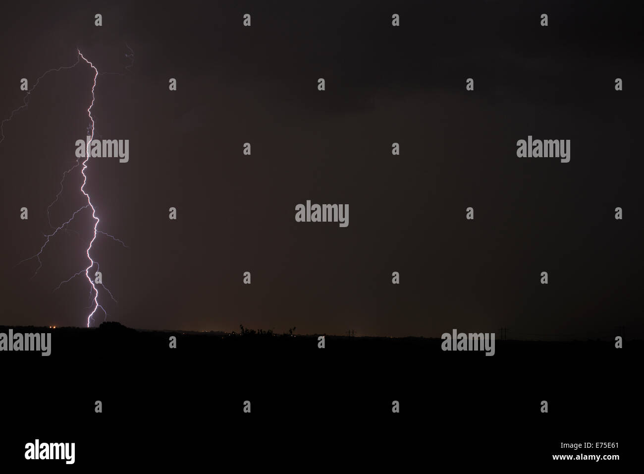 Lightning strike at night Stock Photo - Alamy