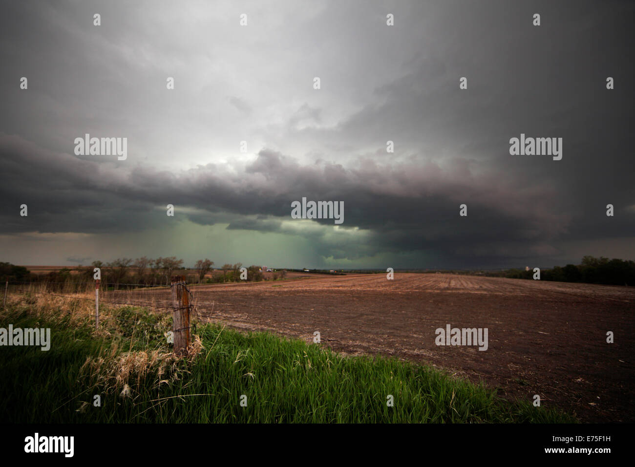 A set of wall clouds near an inflow notch on a hook-echo thunderstorm ...