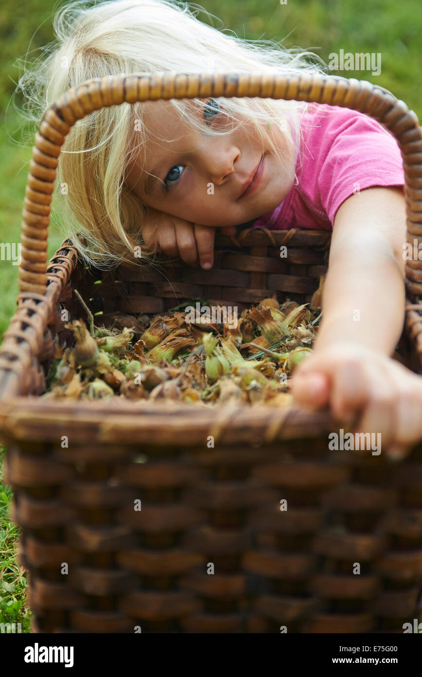Children gathering nuts hi-res stock photography and images - Alamy