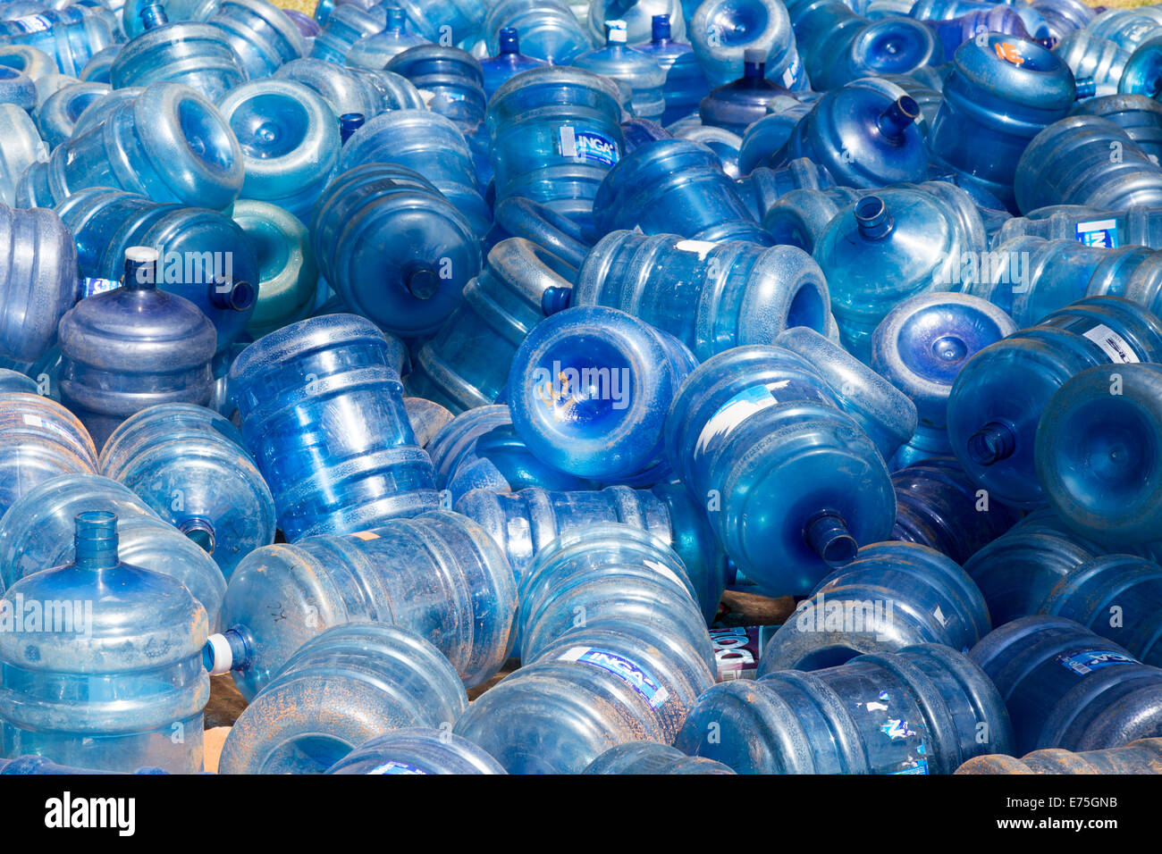 Pile of empty plastic water gallons Stock Photo - Alamy