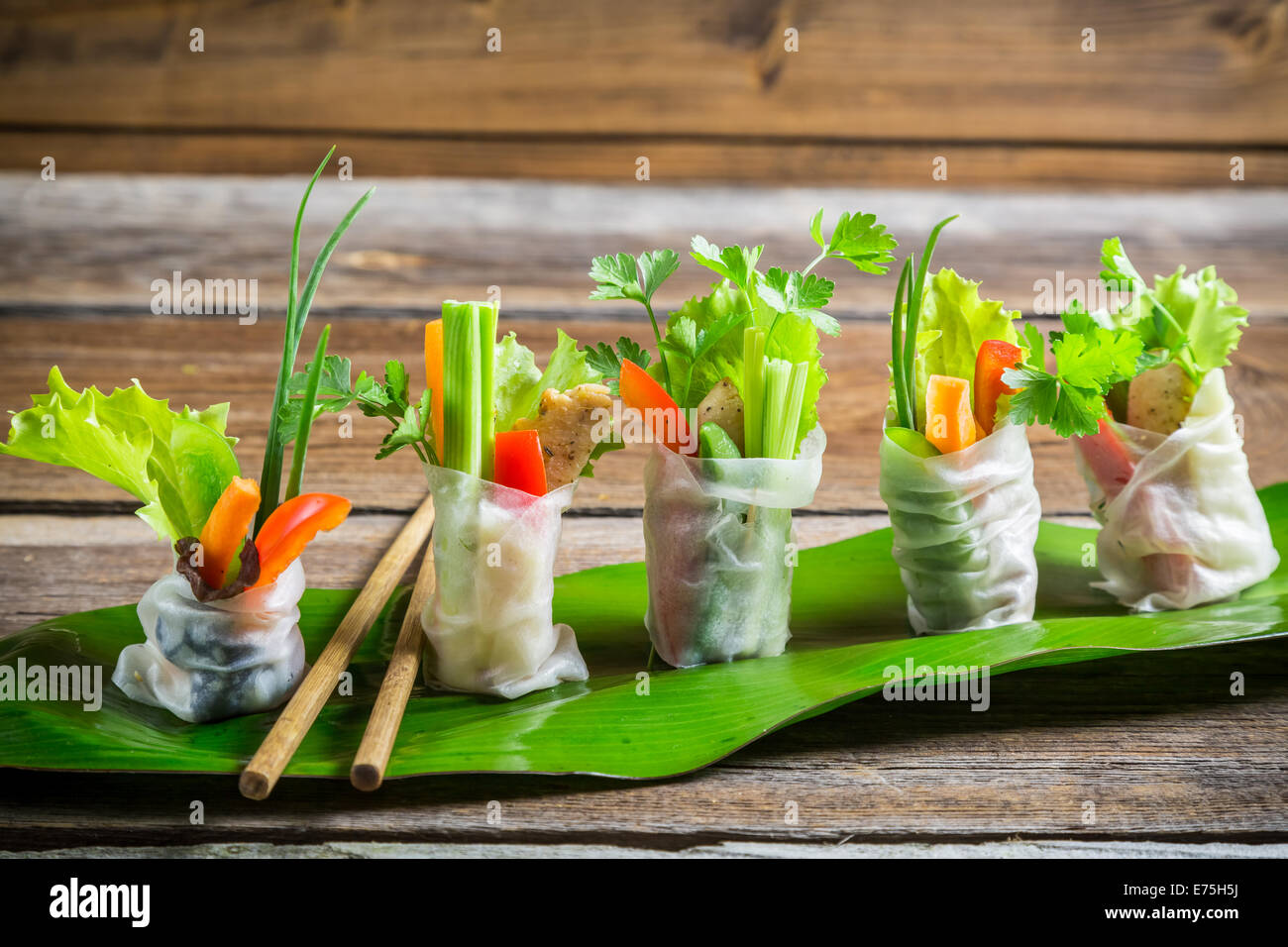 Fresh spring rolls wrapped in rice paper Stock Photo - Alamy