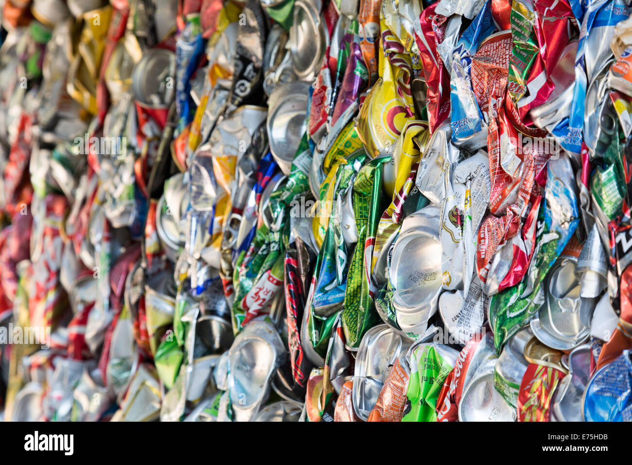 Flattened and compressed cubes of aluminum cans. Aluminum trash ...