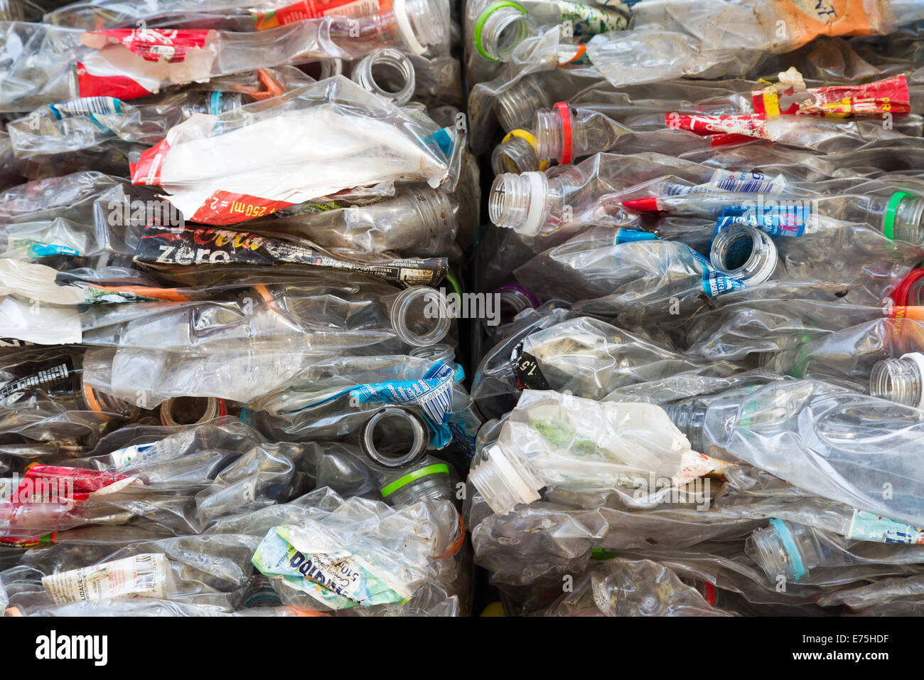 Flattened and compressed cubes of plastic bottles Stock Photo - Alamy