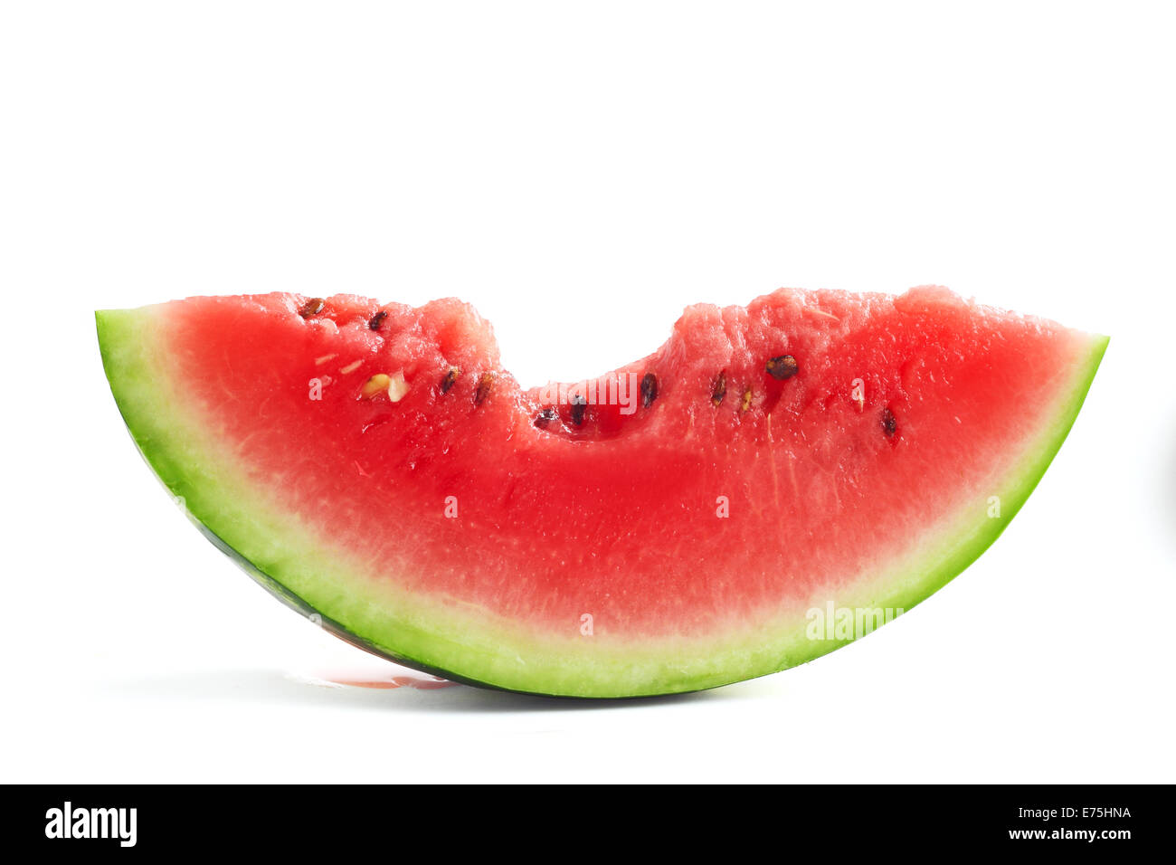 Slice of bitten watermelon isolated on white background Stock Photo - Alamy
