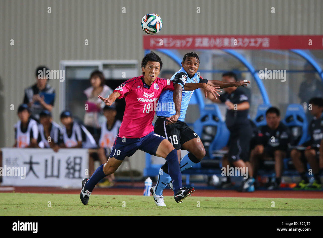 Kawasaki Todoroki Stadium, Kanagawa, Japan. 7th Sep, 2014. (L to R) Yuki Kotani (Cerezo), Renato ...