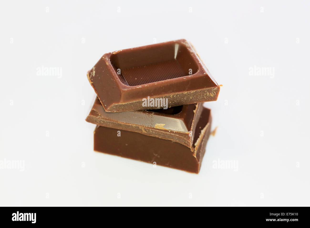 Chocolate bars stack isolated on white background Stock Photo - Alamy