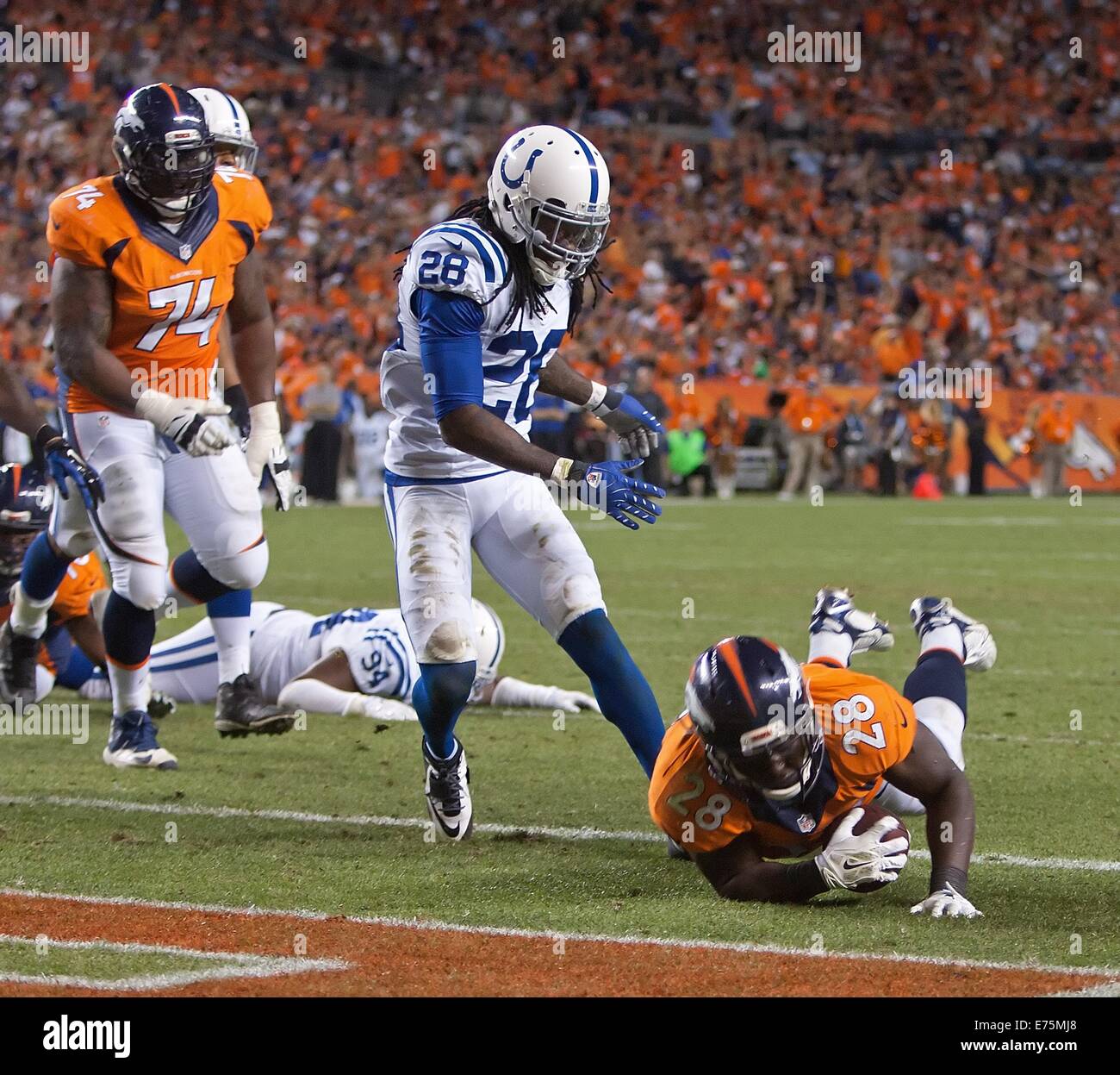 Denver, Colorado, USA. 7th Sep, 2014. Broncos RB MONTEE BALL, right ...
