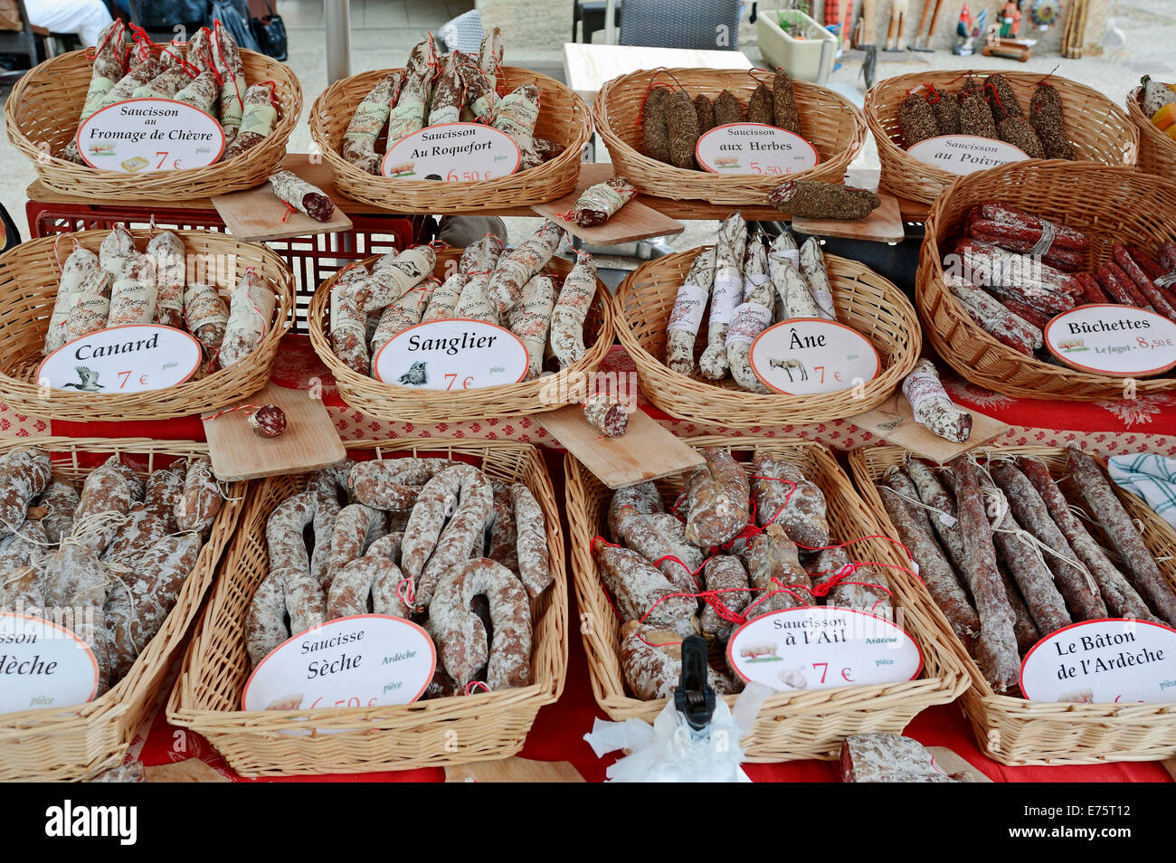 Market stall with various types of dried meat, Bédoin, Vaucluse ...