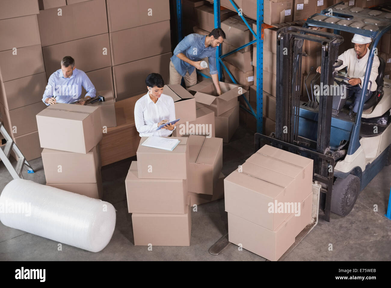 Warehouse workers preparing a shipment Stock Photo - Alamy