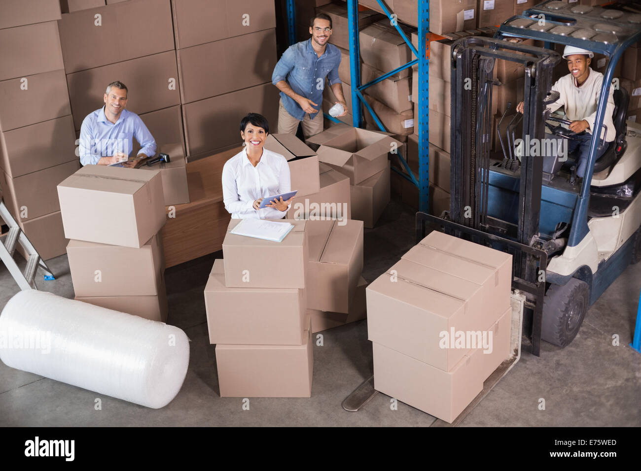 Warehouse workers preparing a shipment Stock Photo - Alamy
