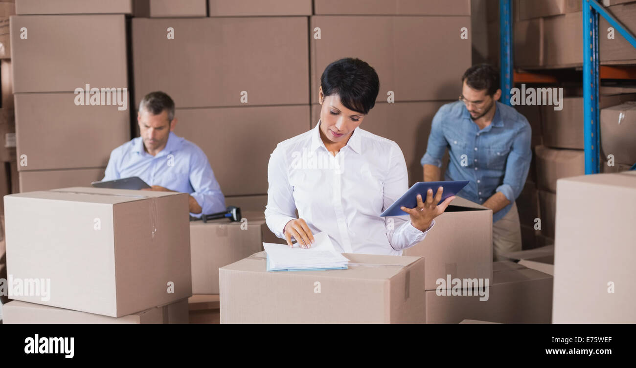 Warehouse workers preparing a shipment Stock Photo - Alamy
