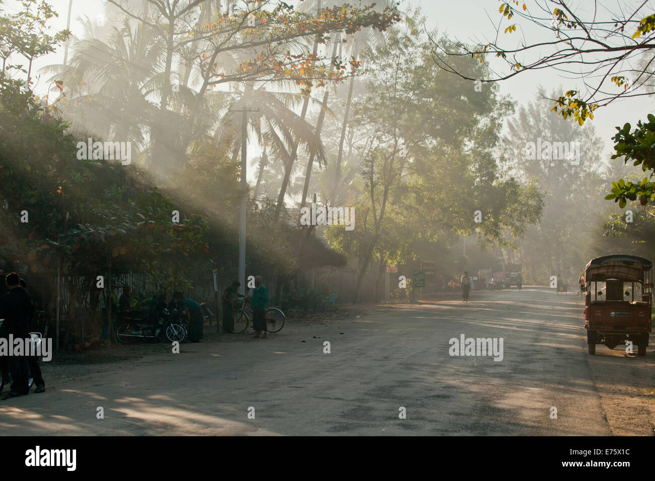Early morning on a village road, sun rays, Ngapali Beach, Thandwe ...
