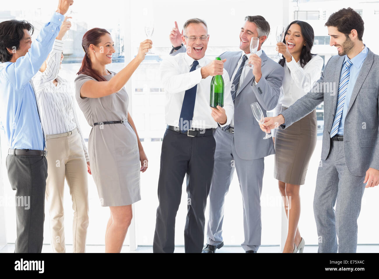 Business workers having a party Stock Photo - Alamy