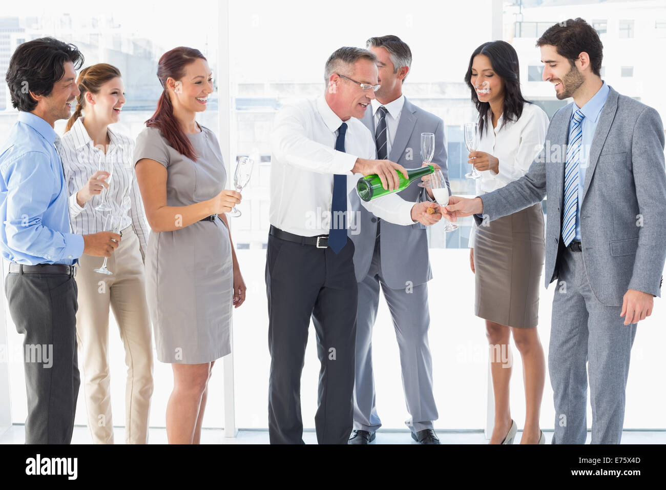 Business workers having a party Stock Photo - Alamy