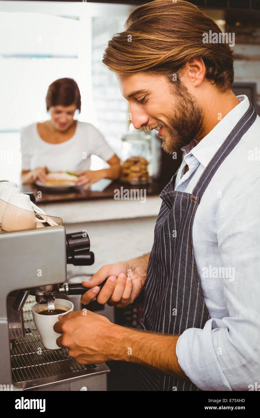 Barista making a cup of coffee Stock Photo - Alamy