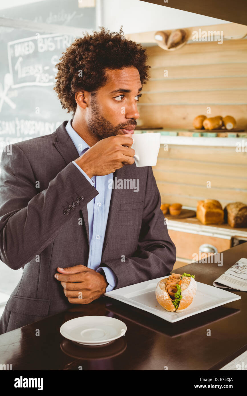 Businessman enjoying his lunch hour Stock Photo - Alamy