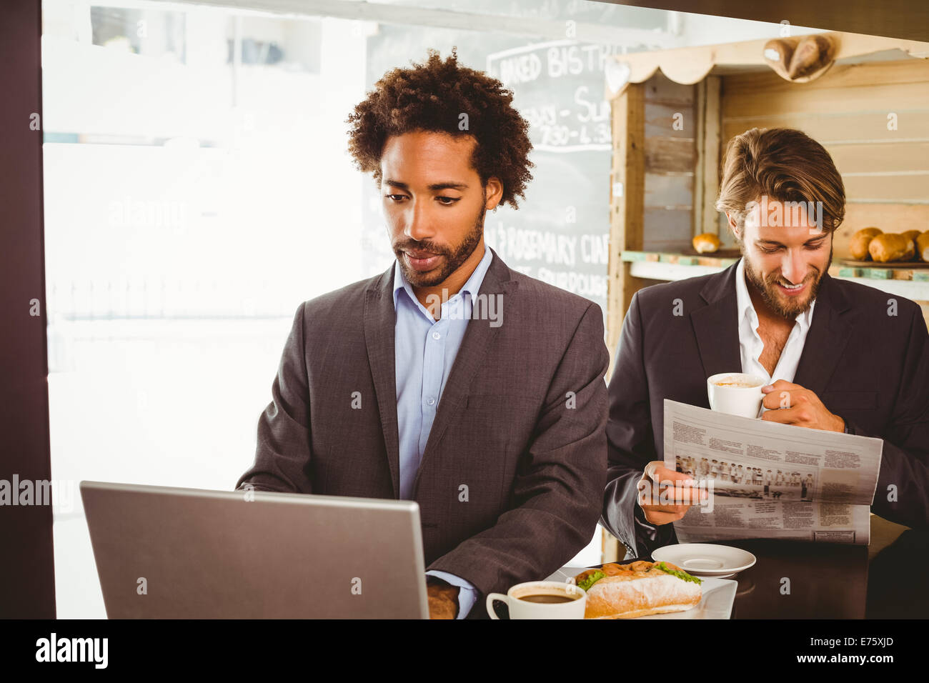Businessmen enjoying their lunch hour Stock Photo - Alamy