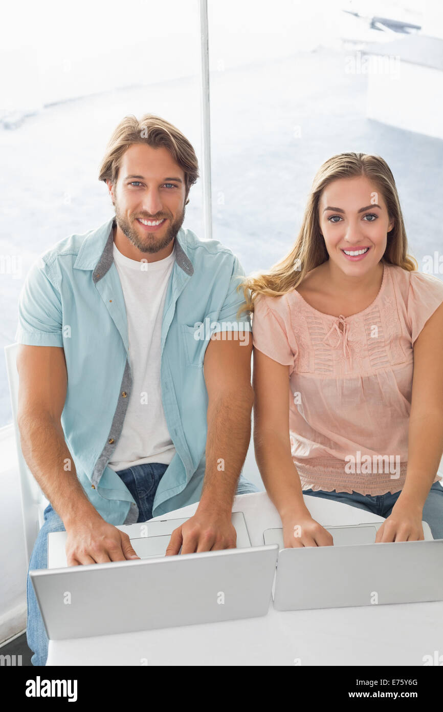 Couple laptops hi-res stock photography and images - Alamy
