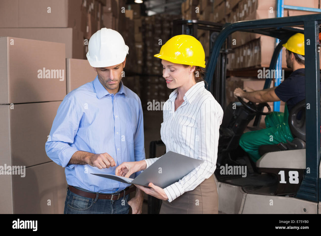 Manager speaking to colleague hi-res stock photography and images - Alamy