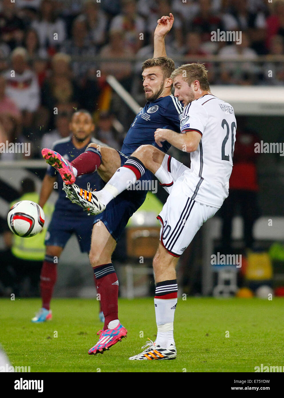 Scotlands James Morrison (L) against Germanys Christoph Kramer during ...