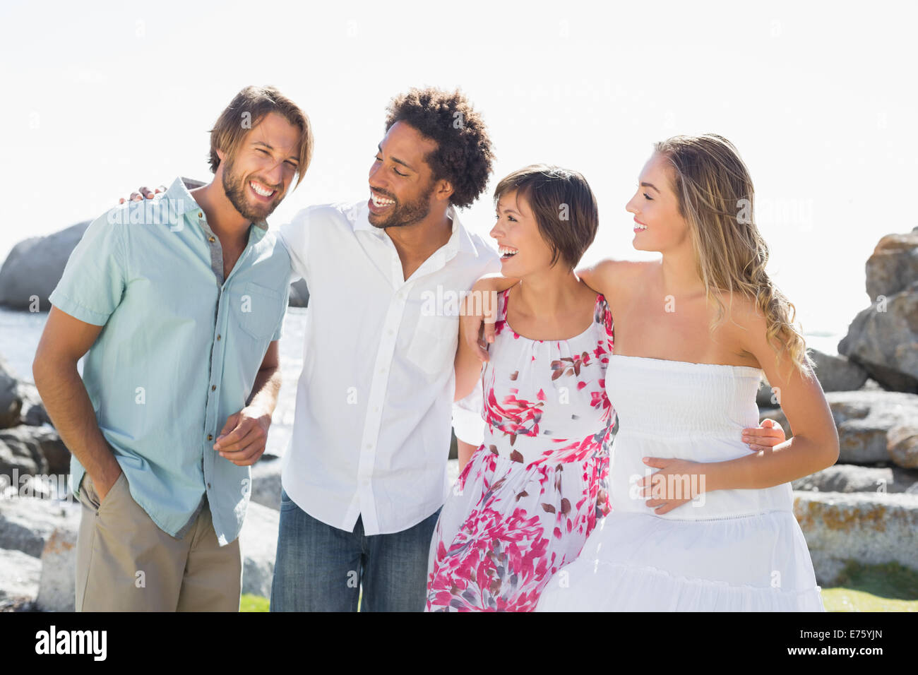 Gorgeous friends smiling at each other Stock Photo - Alamy