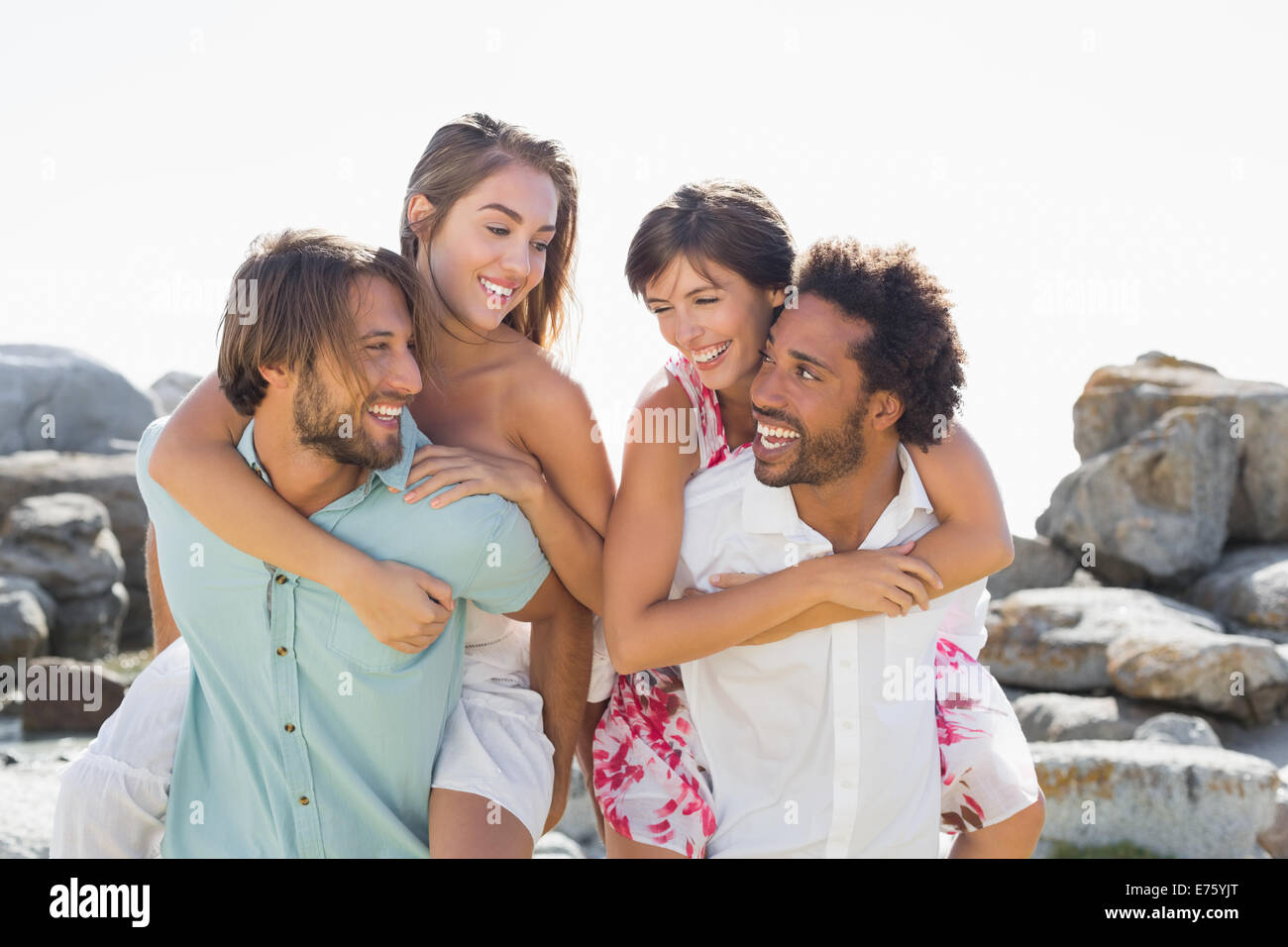 Gorgeous friends smiling at each other Stock Photo - Alamy