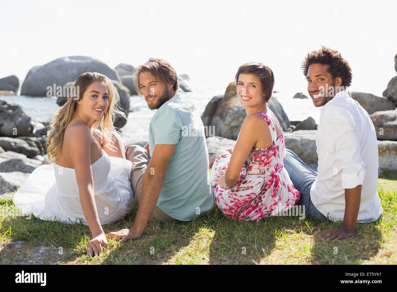 Gorgeous friends smiling at camera Stock Photo - Alamy