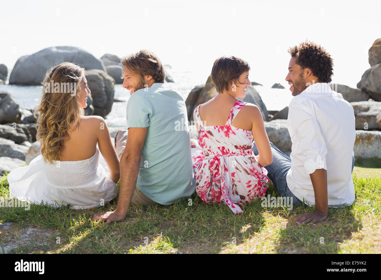 Gorgeous friends smiling at each other Stock Photo - Alamy