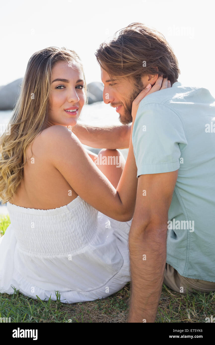 Gorgeous couple smiling at camera Stock Photo - Alamy