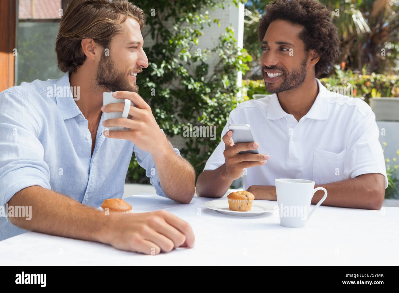 Two friends enjoying coffee together Stock Photo - Alamy