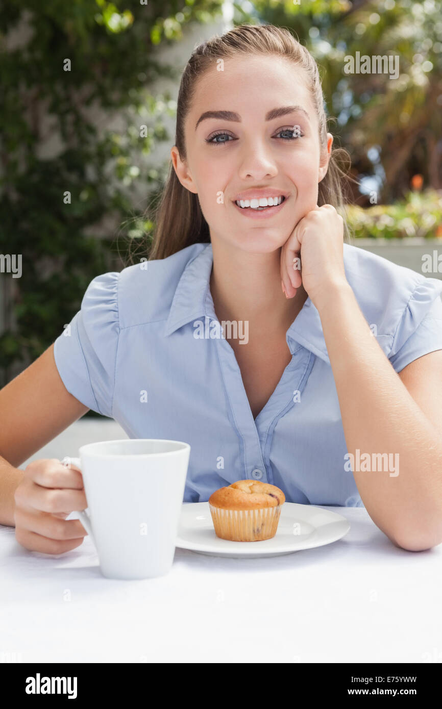 Beautiful woman having a coffee Stock Photo - Alamy