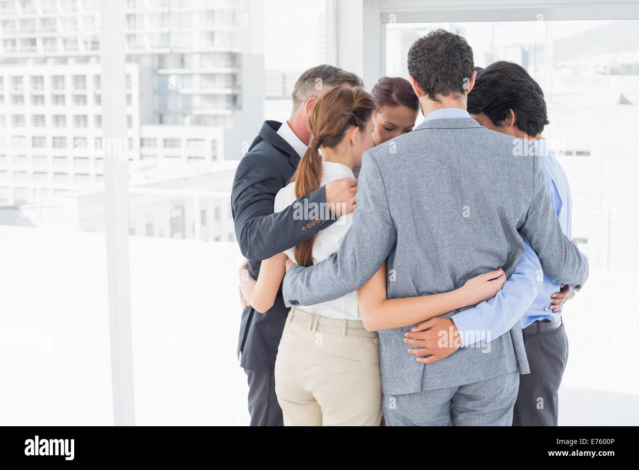 Young huddled hi-res stock photography and images - Alamy