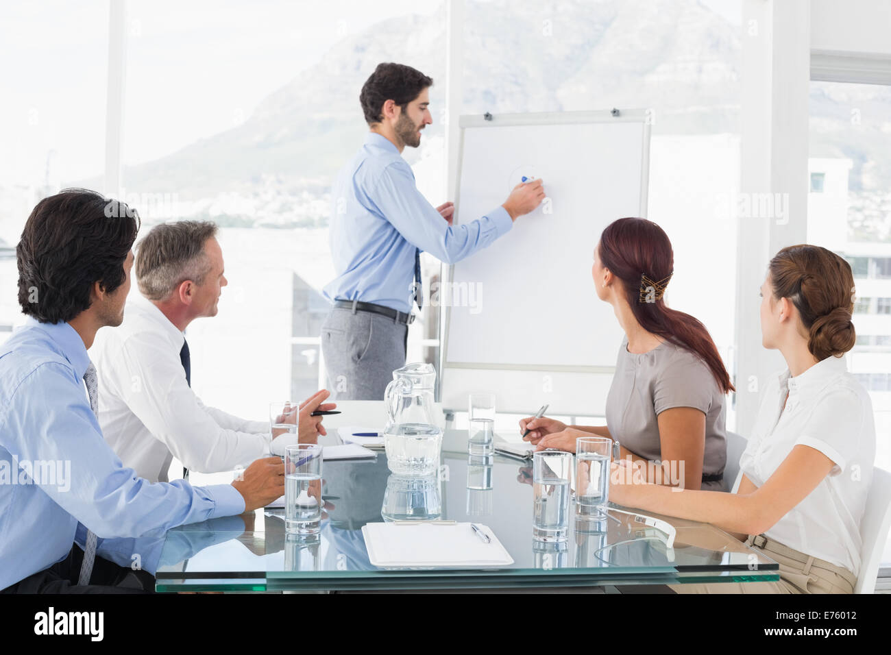 Business man giving a presentation Stock Photo - Alamy