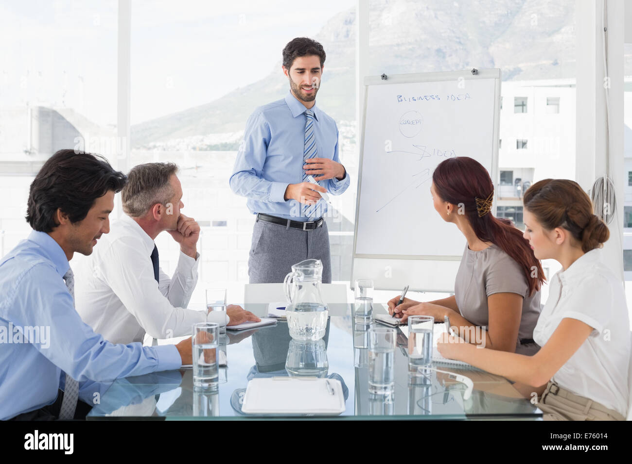 Business man giving a presentation Stock Photo - Alamy