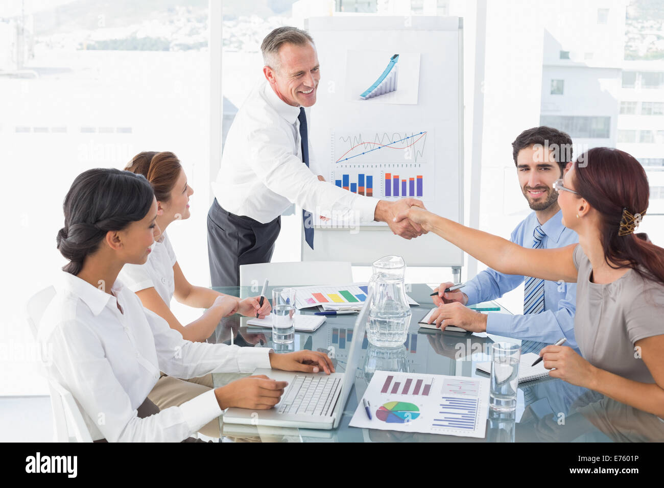 Business man introducing new employee Stock Photo - Alamy