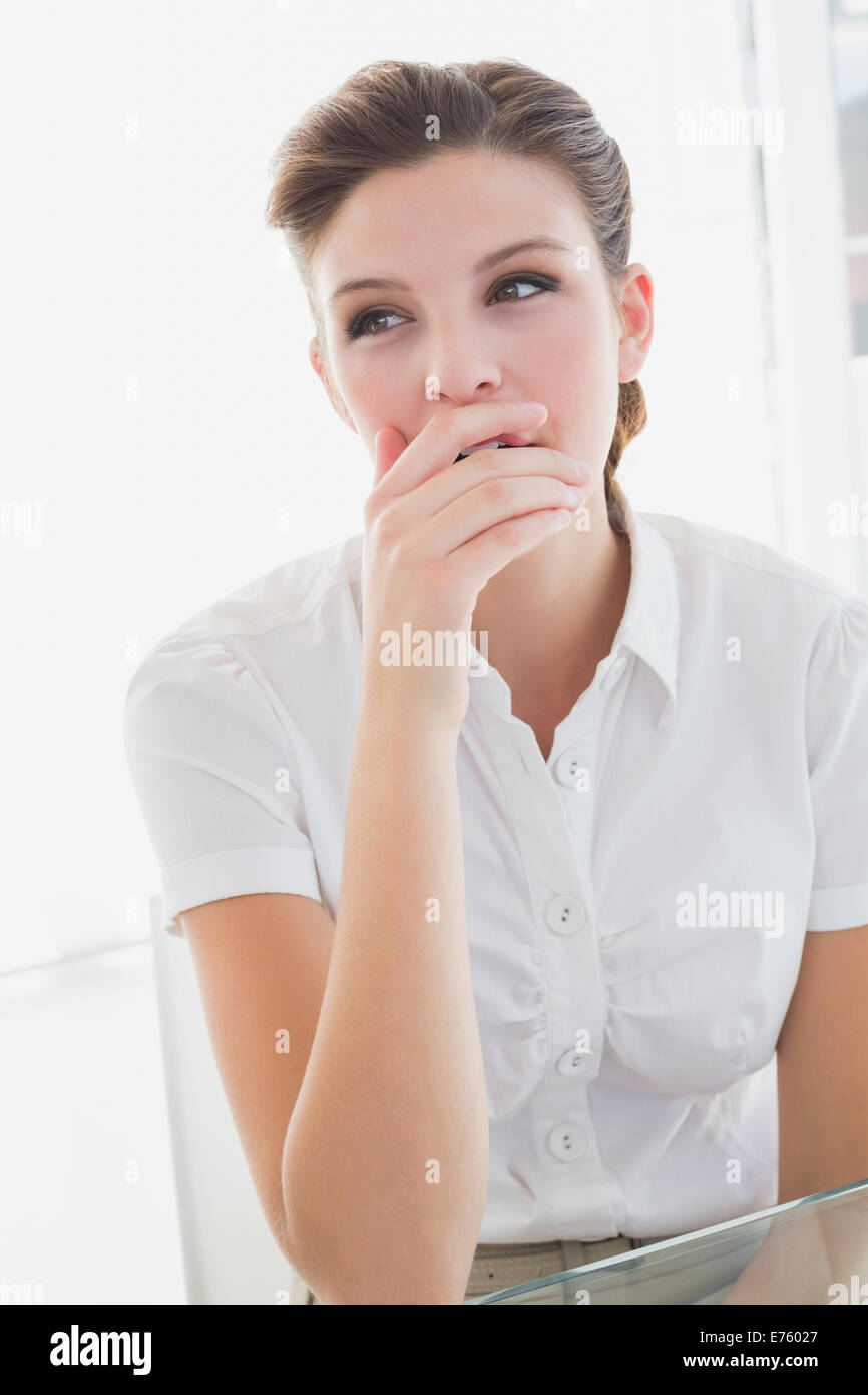 Business woman looking very tired Stock Photo - Alamy