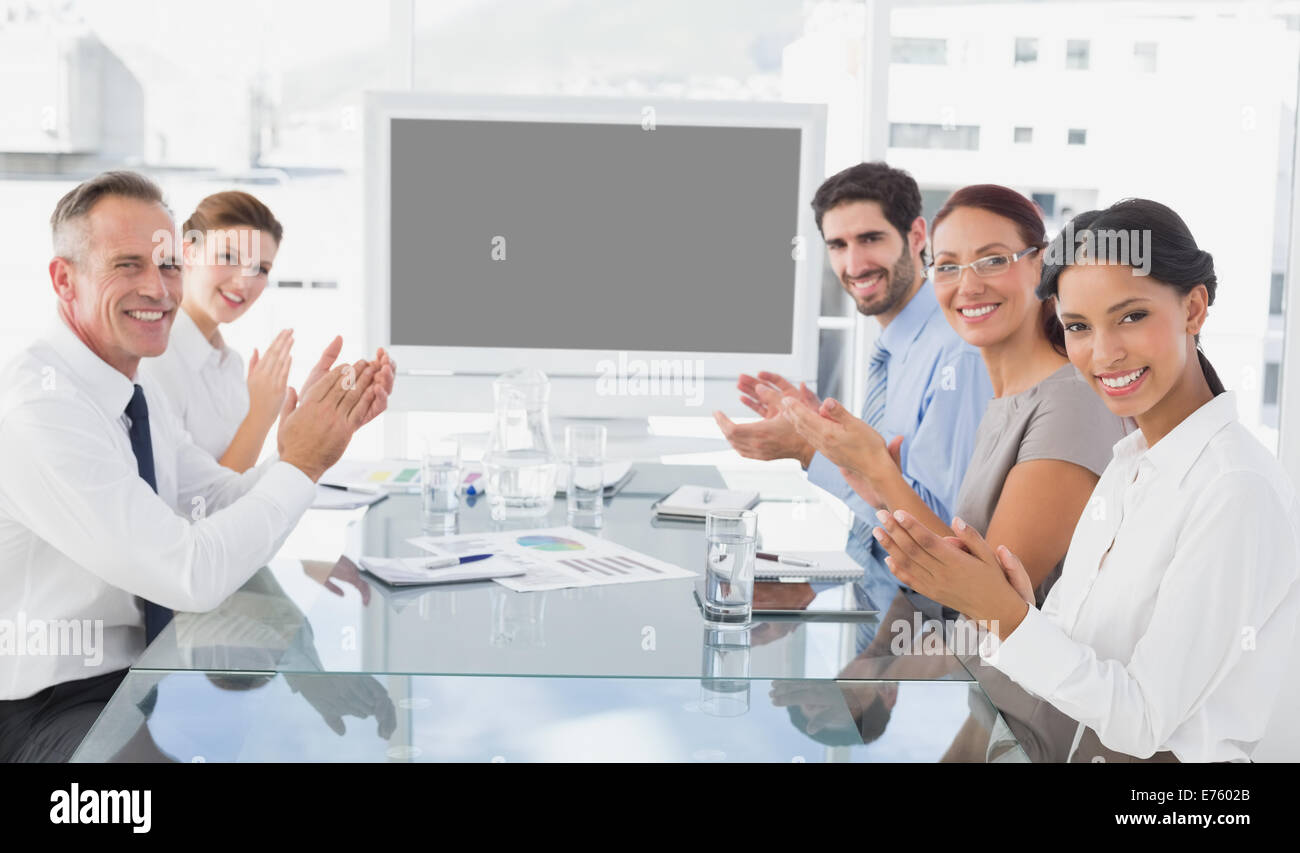 Business colleagues giving applause Stock Photo - Alamy