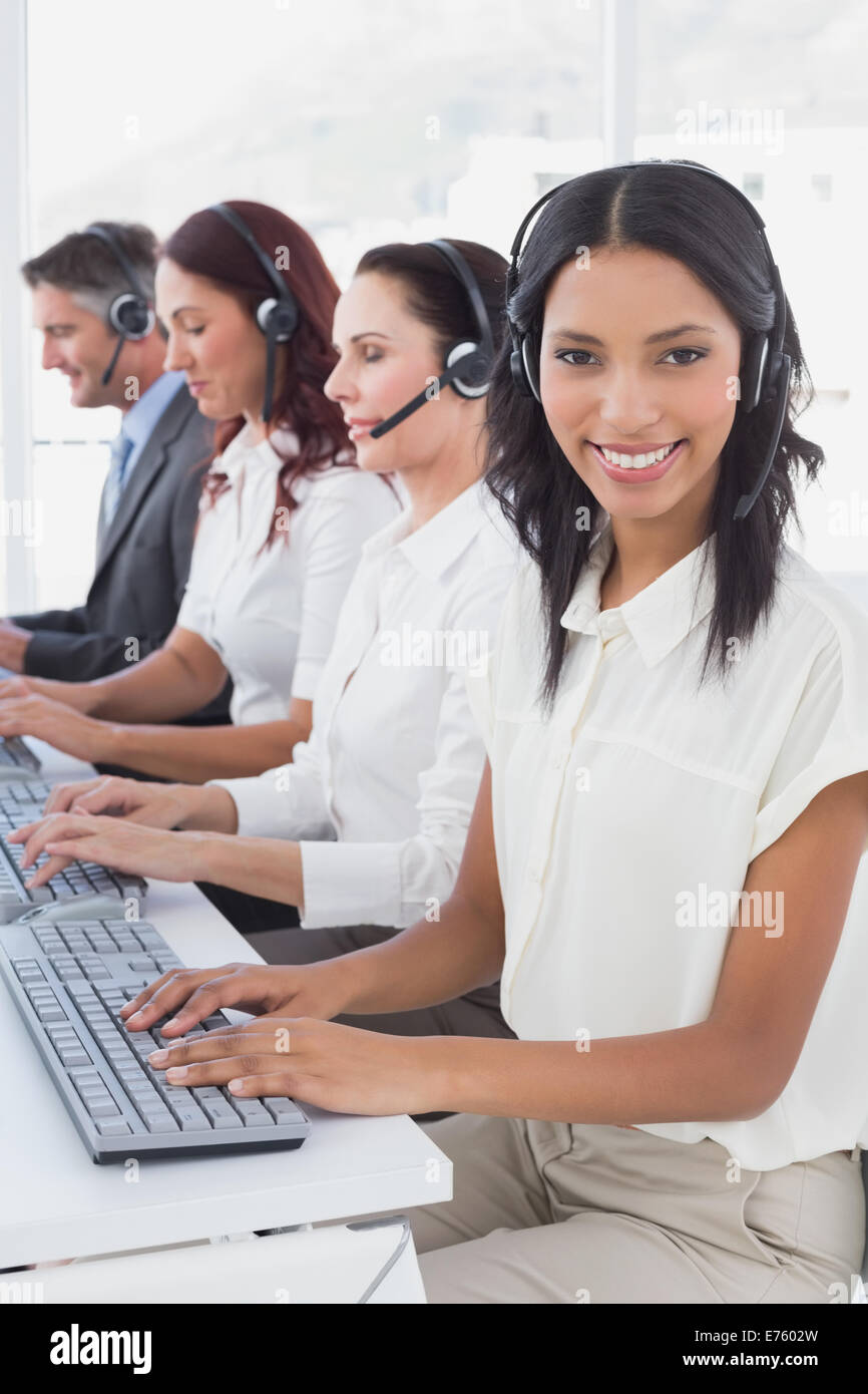 Employee's typing on their computers Stock Photo - Alamy