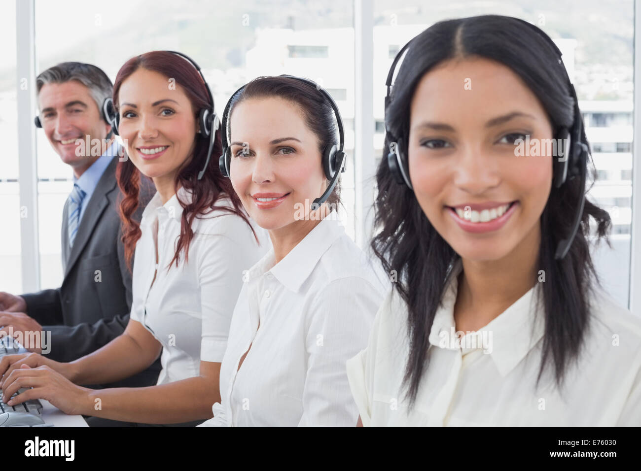Employee's typing on their computers Stock Photo - Alamy