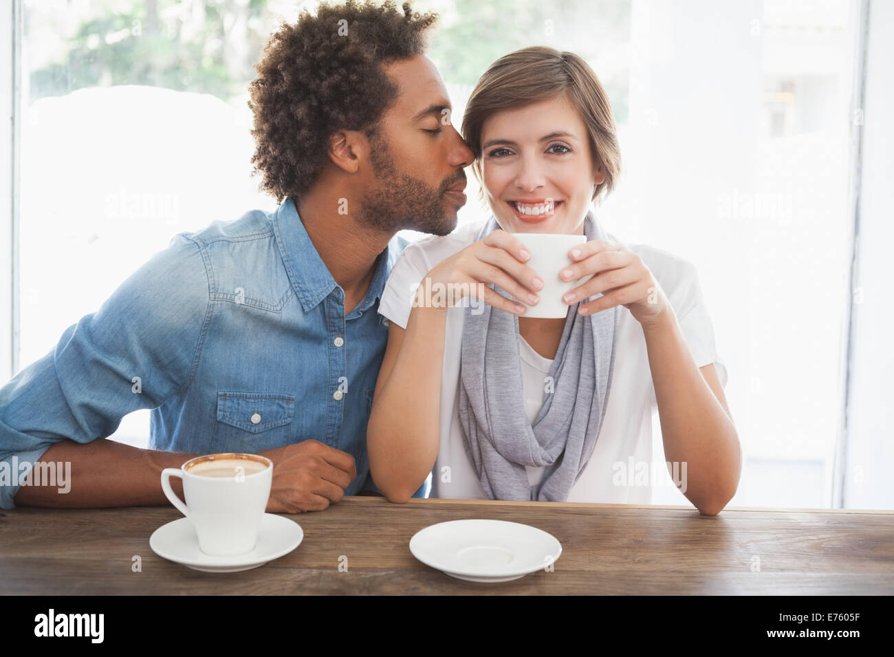 Casual couple having coffee together Stock Photo - Alamy