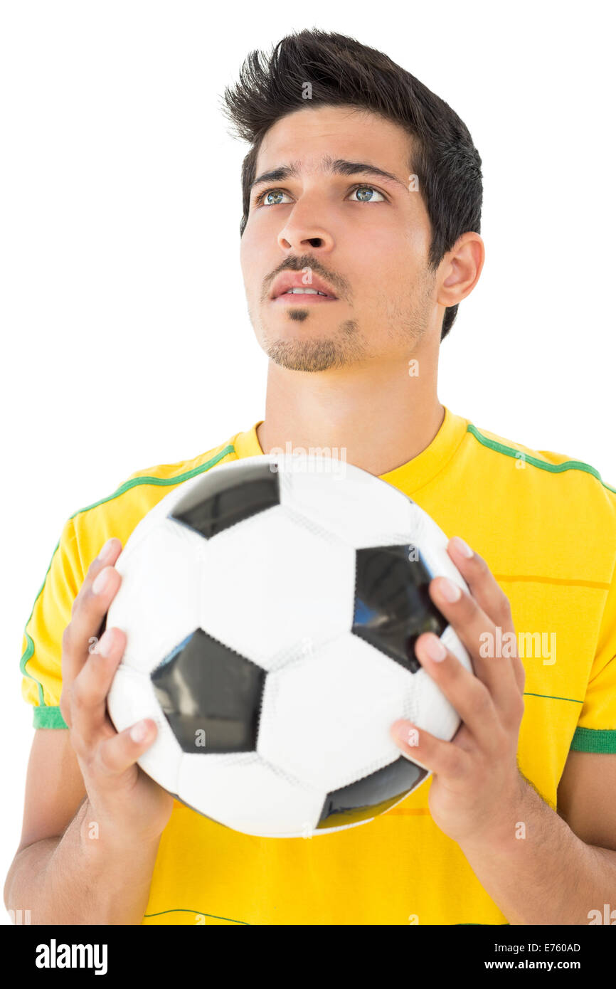 Wearing yellow jersey football player hi-res stock photography and ...