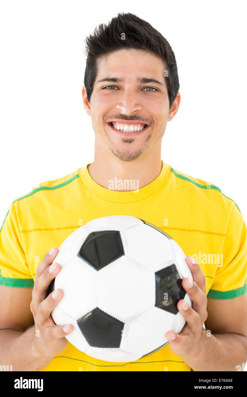 Portrait of a smiling handsome football player Stock Photo - Alamy
