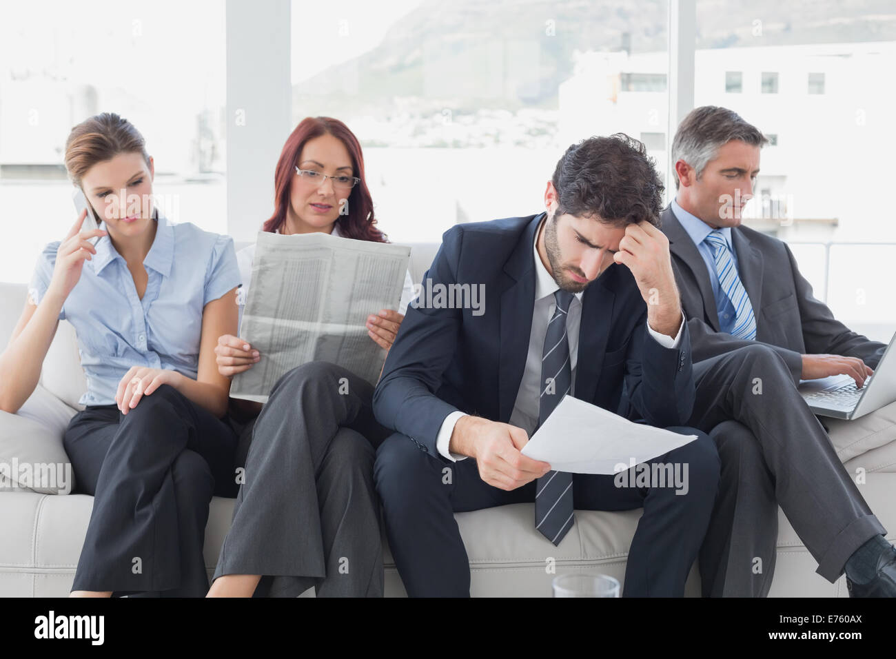 Male female colleagues reviewing work hi-res stock photography and ...