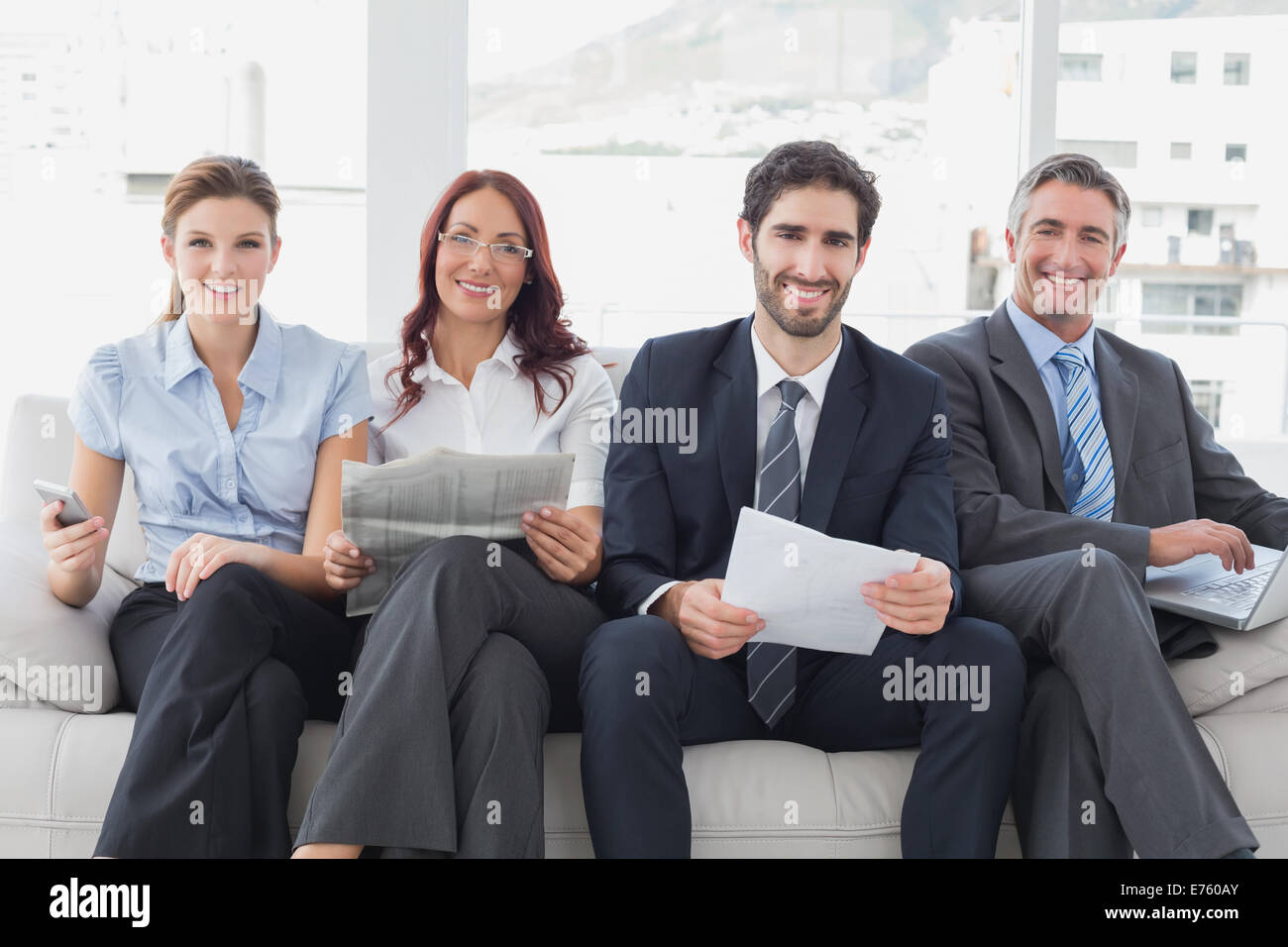 Business team reviewing work notes Stock Photo - Alamy
