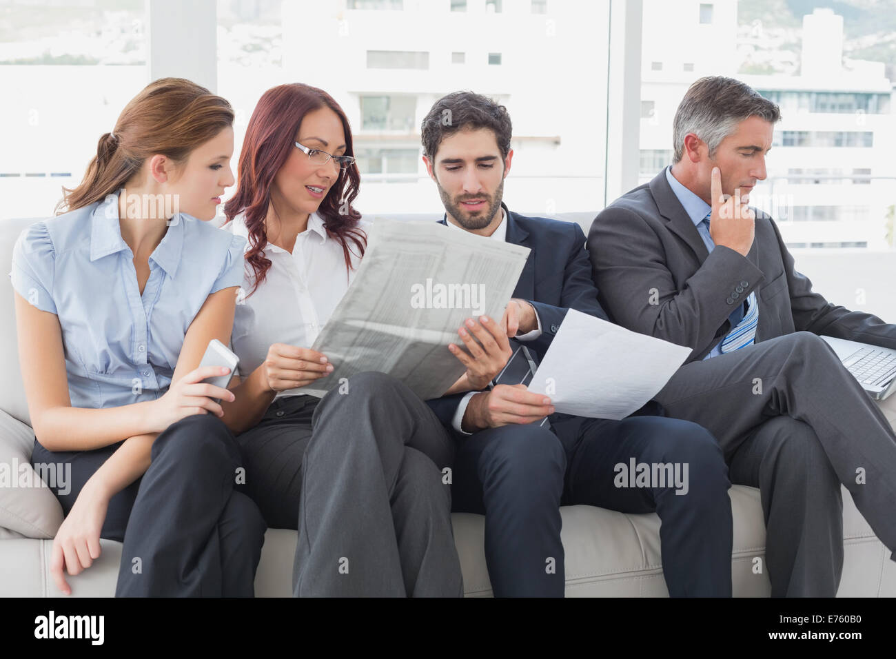 Male female colleagues reviewing work hi-res stock photography and ...