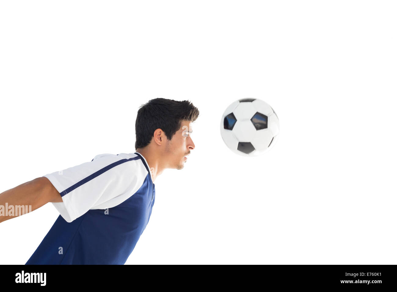 Side view of football player playing Stock Photo - Alamy